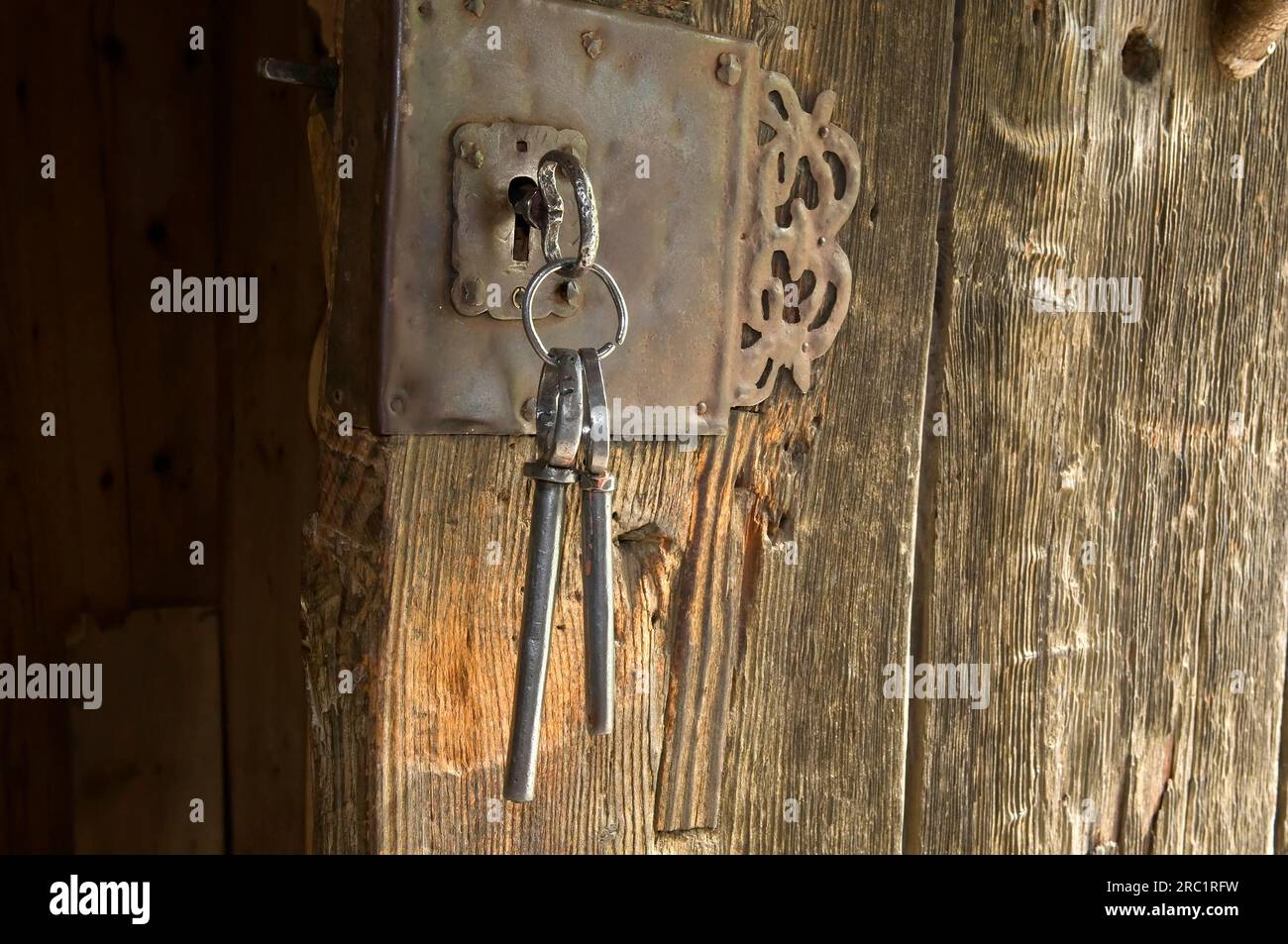 Keys stuck in the lock Stock Photo - Alamy