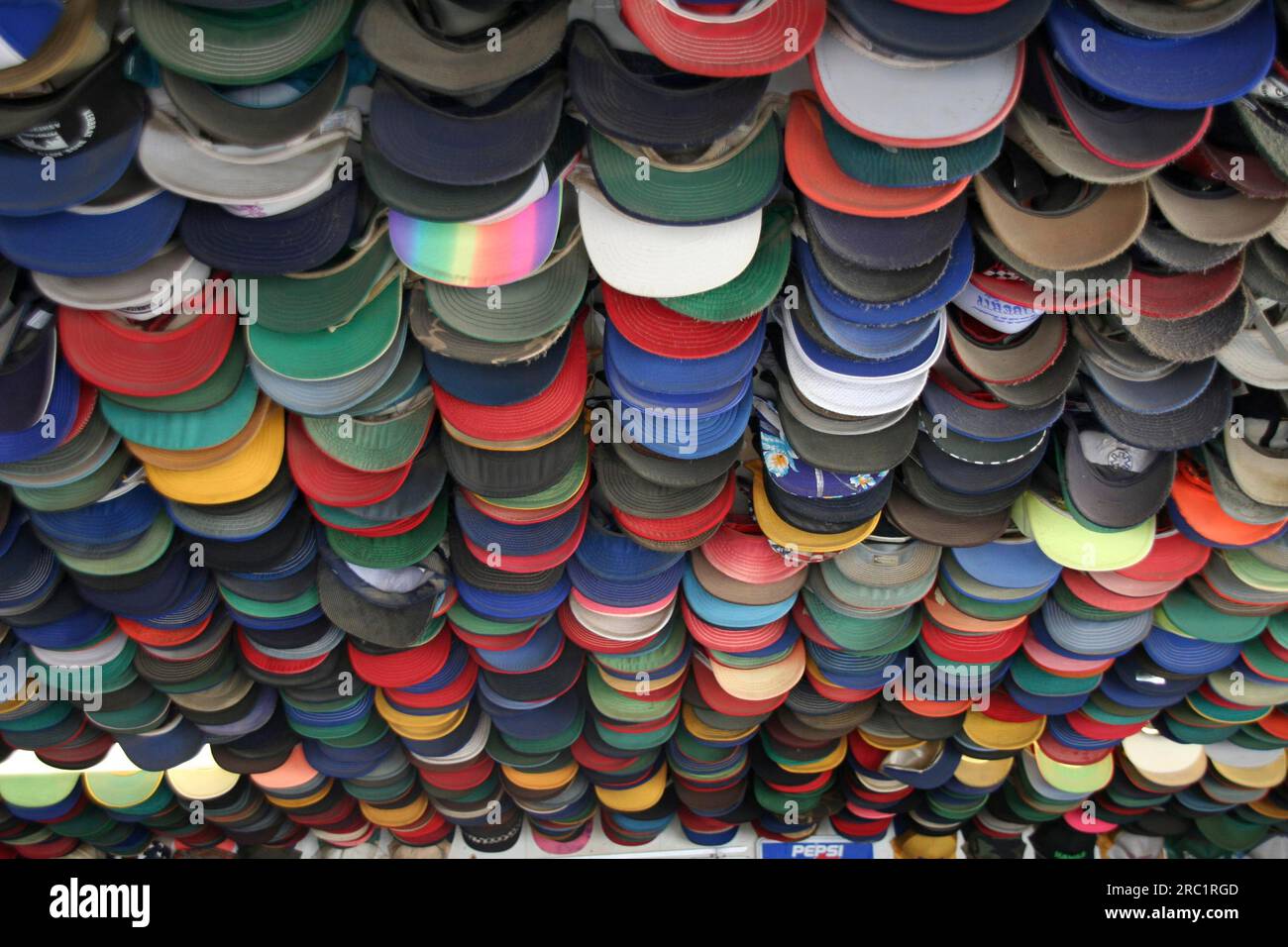 Cap collection at Toad River Lodge on the Alaska Highway, British ...