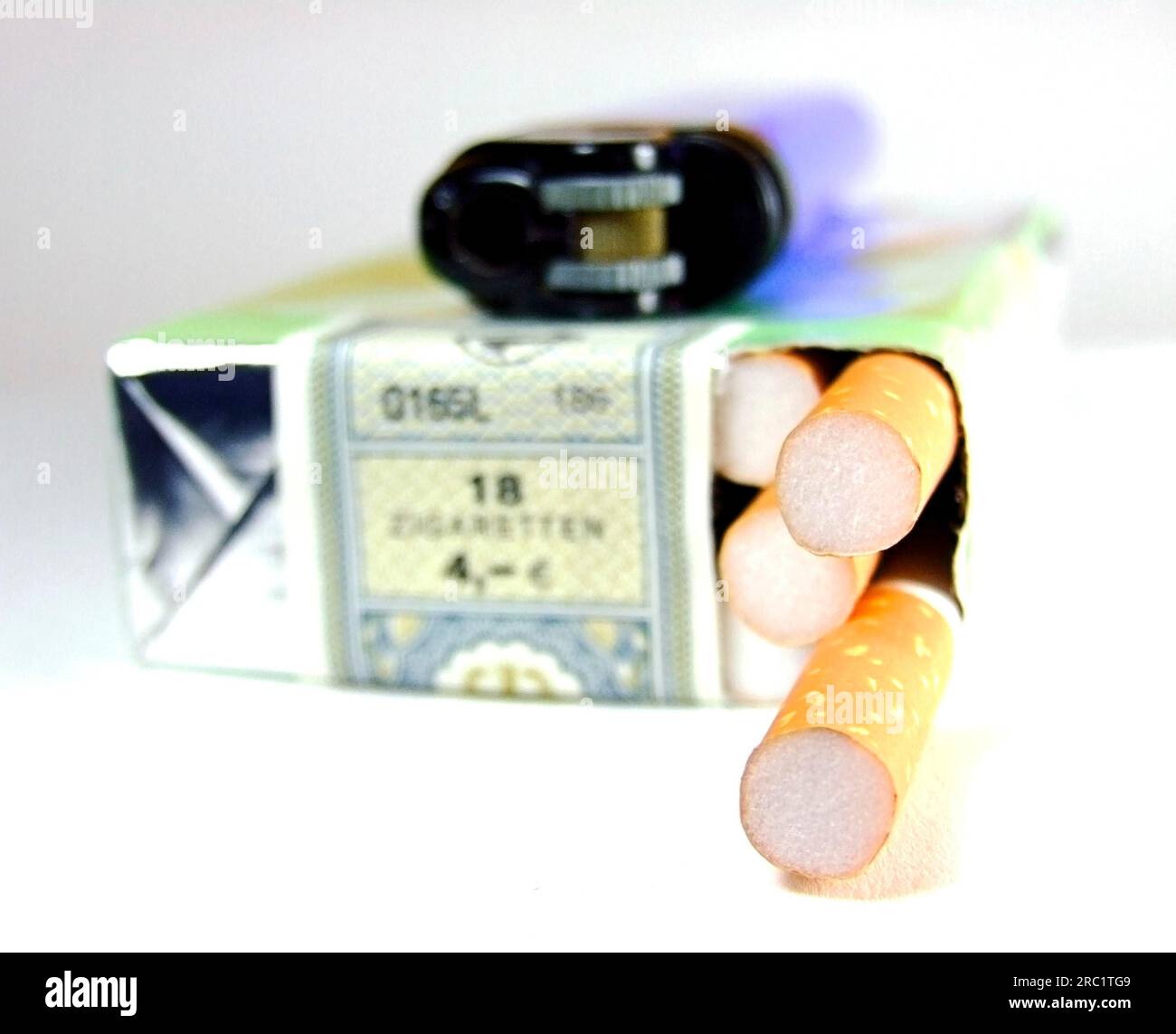 Pack of cigarettes with lighter Stock Photo - Alamy