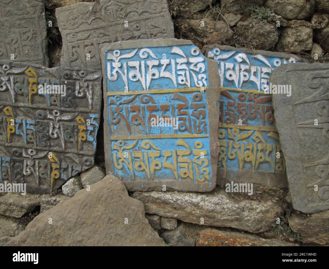Colorful mani stones in Nepal Stock Photo - Alamy