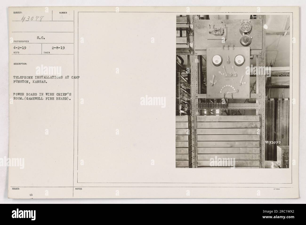 Soldiers from Camp Funston in Kansas are pictured inspecting telephone ...