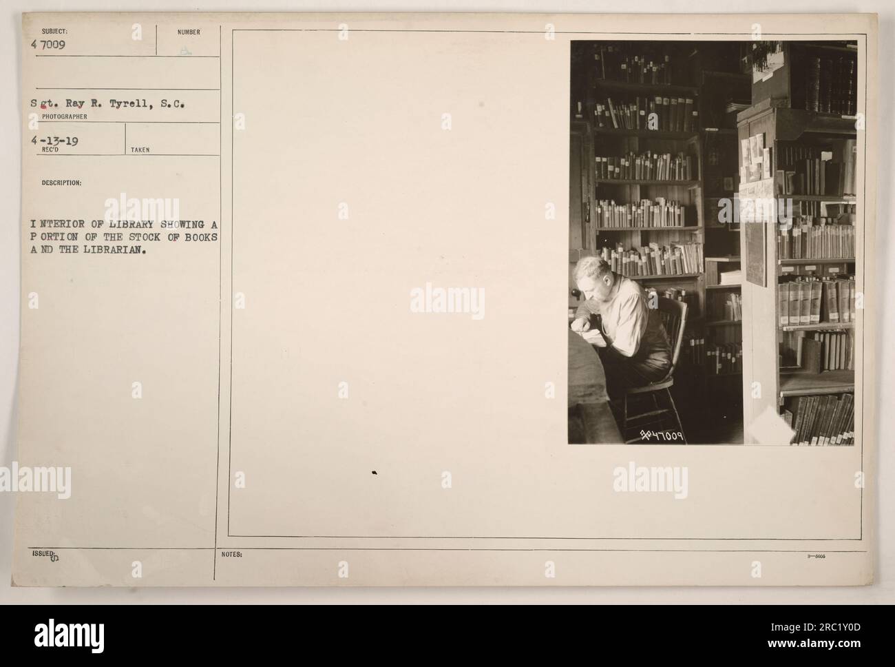 Interior view of a library during World War One, showing a section of ...