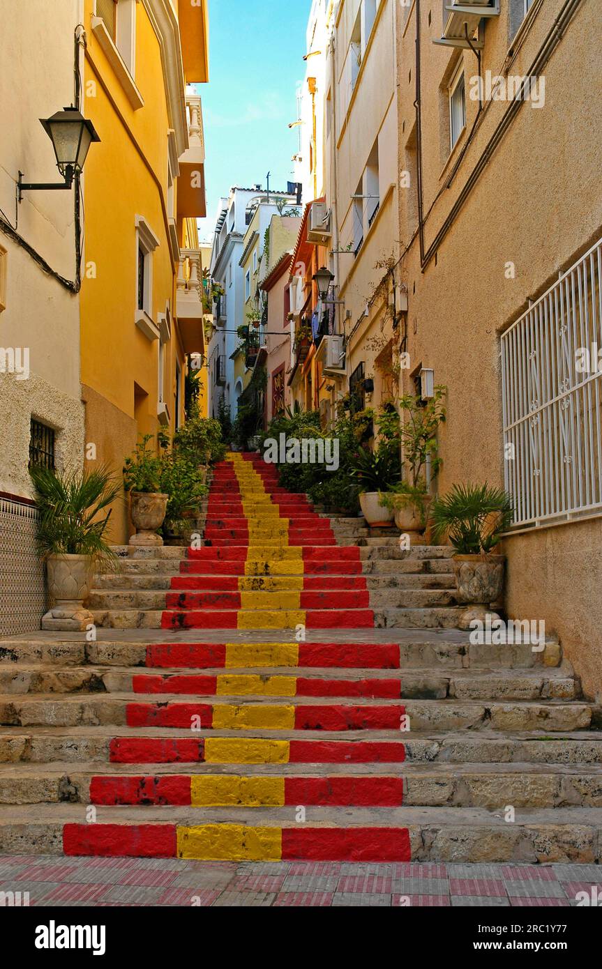 Stairs in Spanish national colour, alley in old town, Calpe, Costa ...