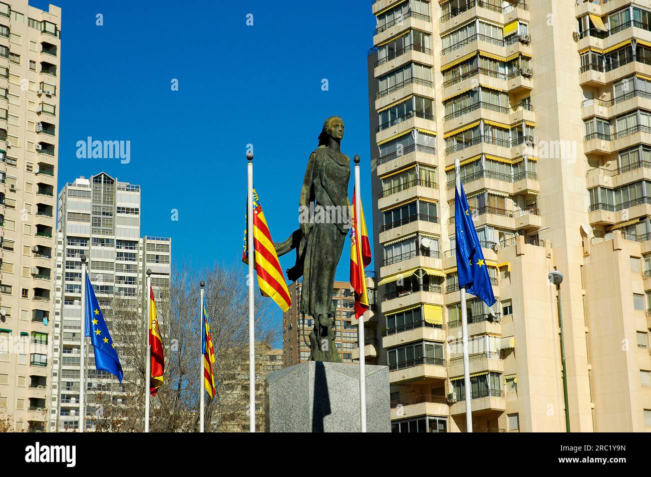 Statue and flags in Europe Square, Benidorm, Costa Blanca, Spain Stock ...