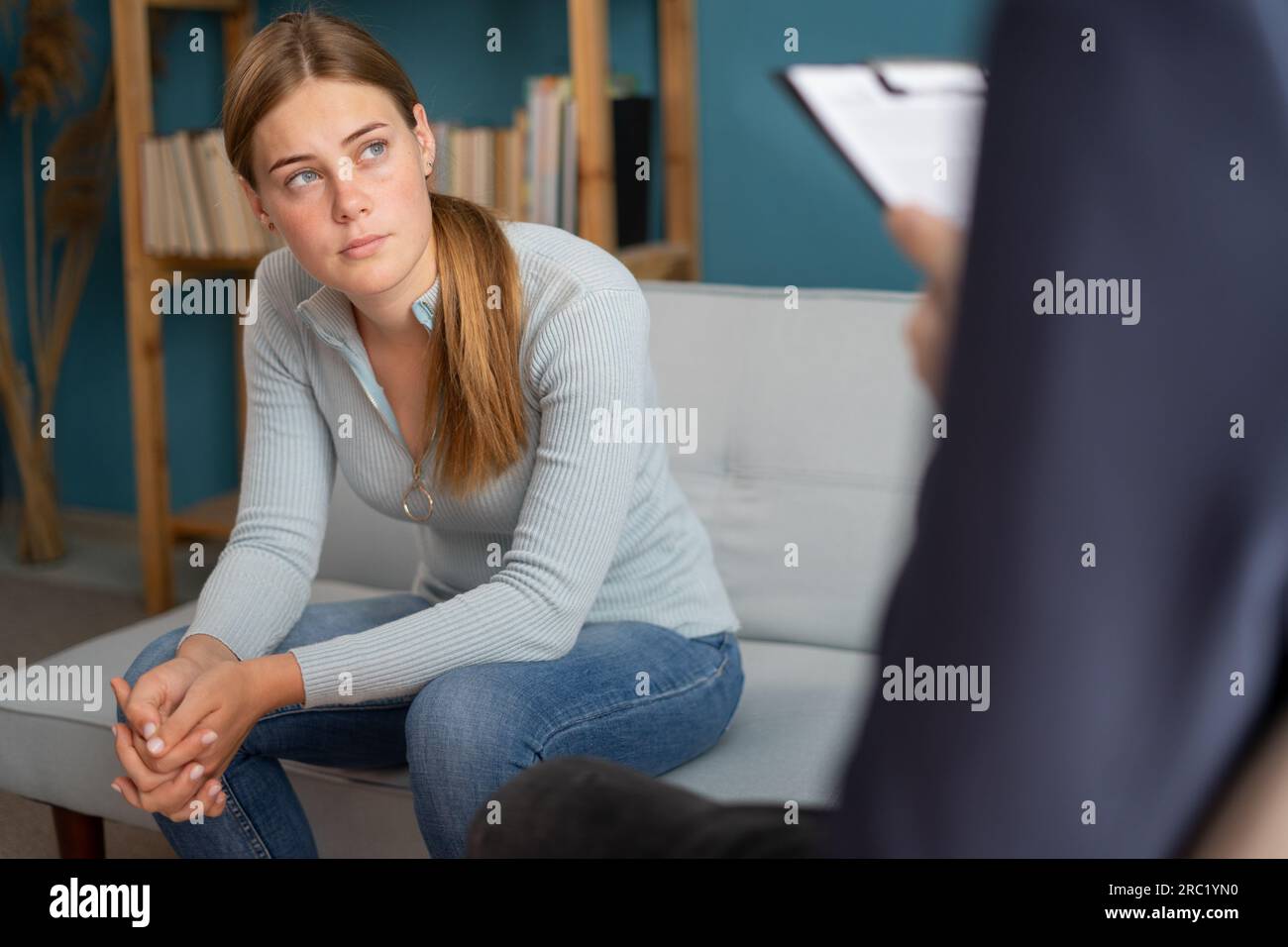 Psychologist working with a teenager in his office. Psychotherapy ...