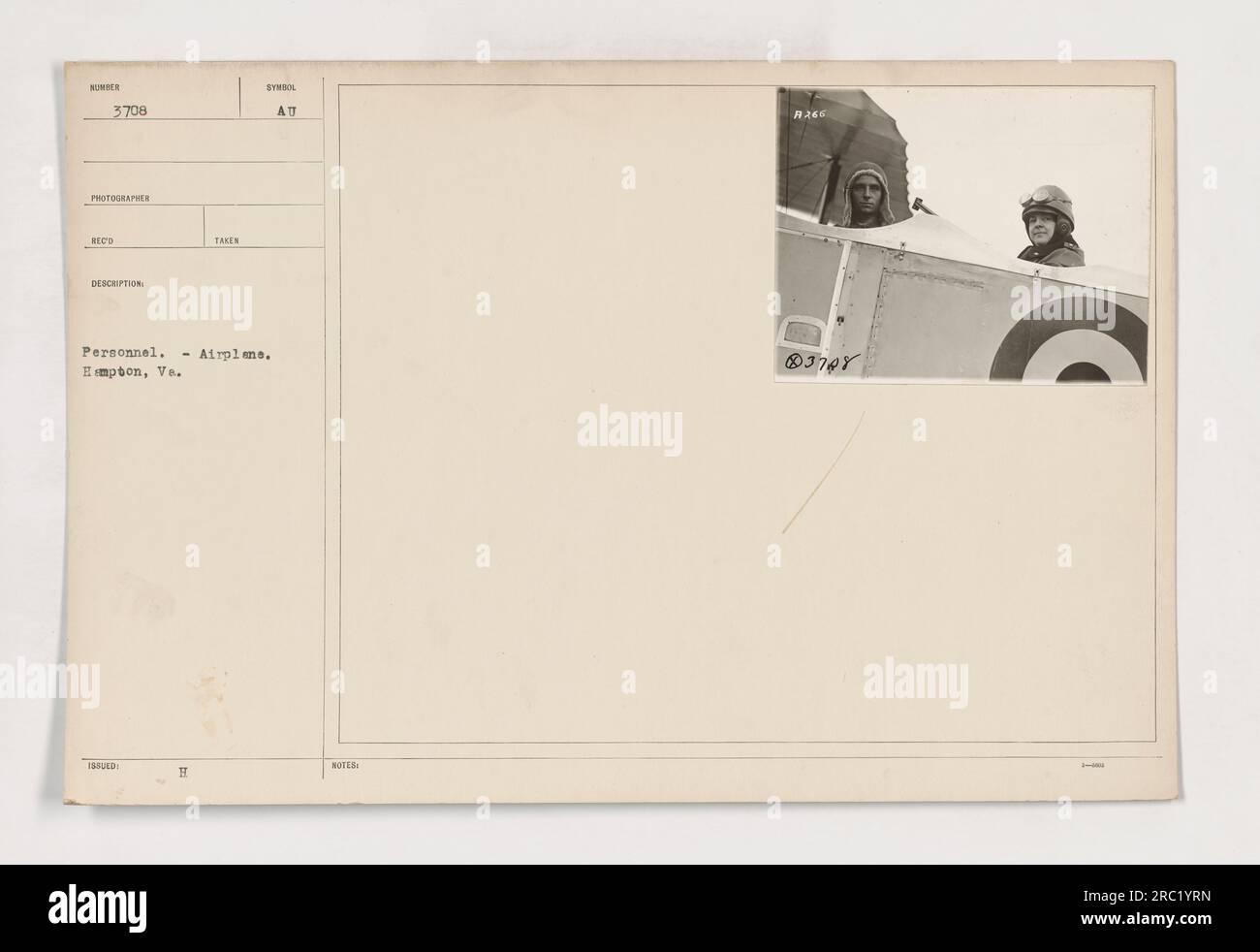 This photograph captures American military personnel loading equipment ...