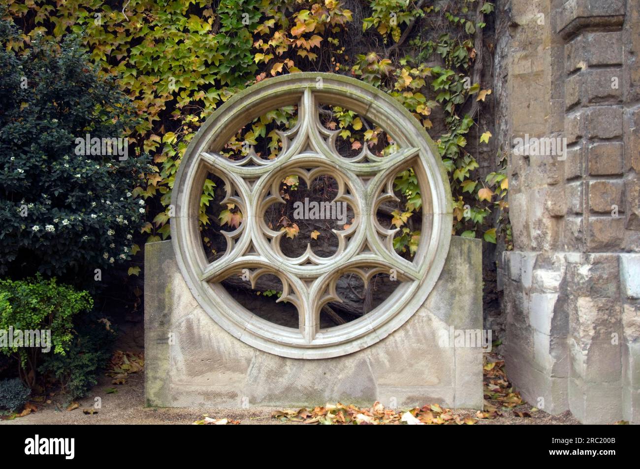 Rose window, garden of the Hotel de Sully, Place des Vosges, Marais ...