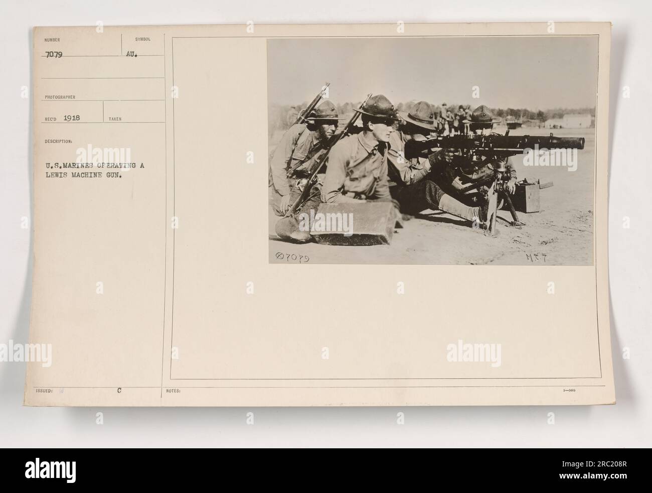 U.S. Marines operating a Lewis machine gun during World War One. This ...
