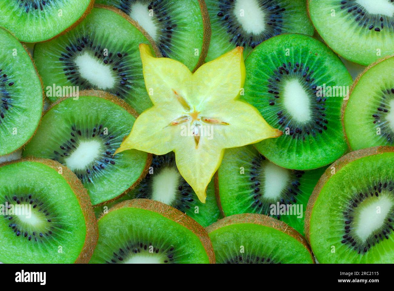 Carambola on Chinese gooseberry slices (Averrhoa carambola) ) (starry ...