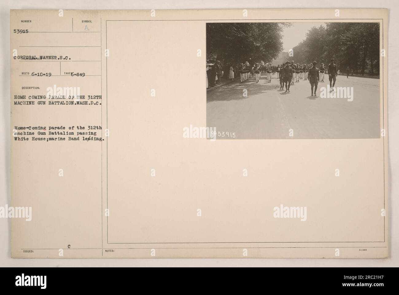 Caption: Homecoming parade of the 312th Machine Gun Battalion ...