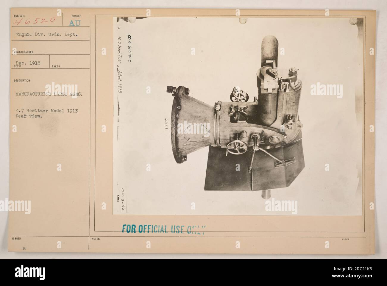 A rear view photograph of the manufacturing process of a 4.7 Howitzer ...