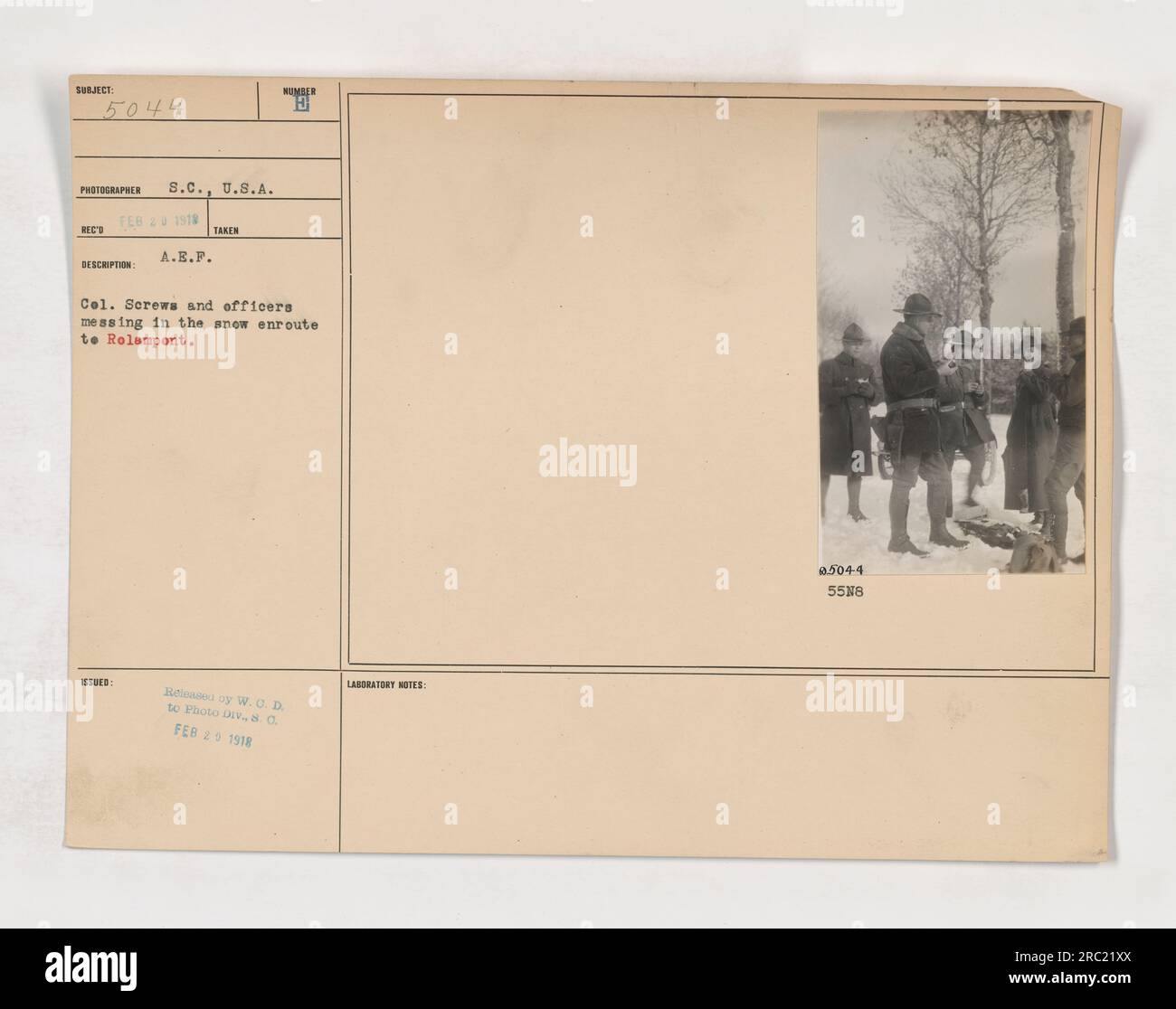 Soldiers and officers led by Col. Screws are seen having a meal in the ... Soldiers and officers led by Col. Screws are seen having a meal in the ...