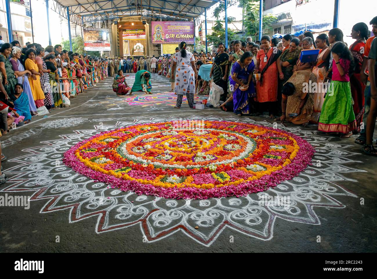 Kolam and floral decoration in front of Kapaleeshwarar temple during a ...