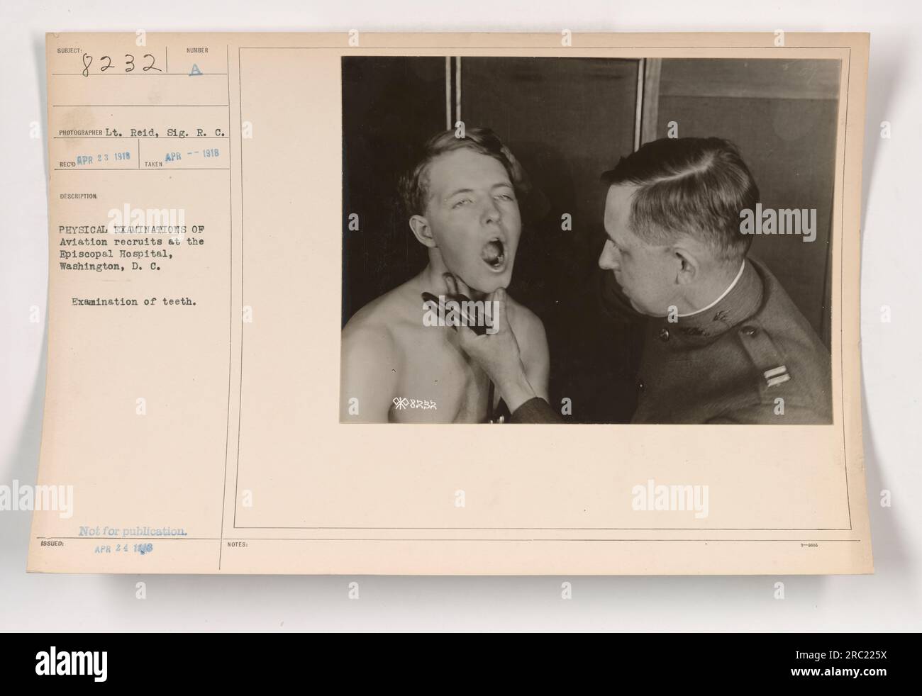 Aviation recruits undergoing physical examinations, specifically dental ...