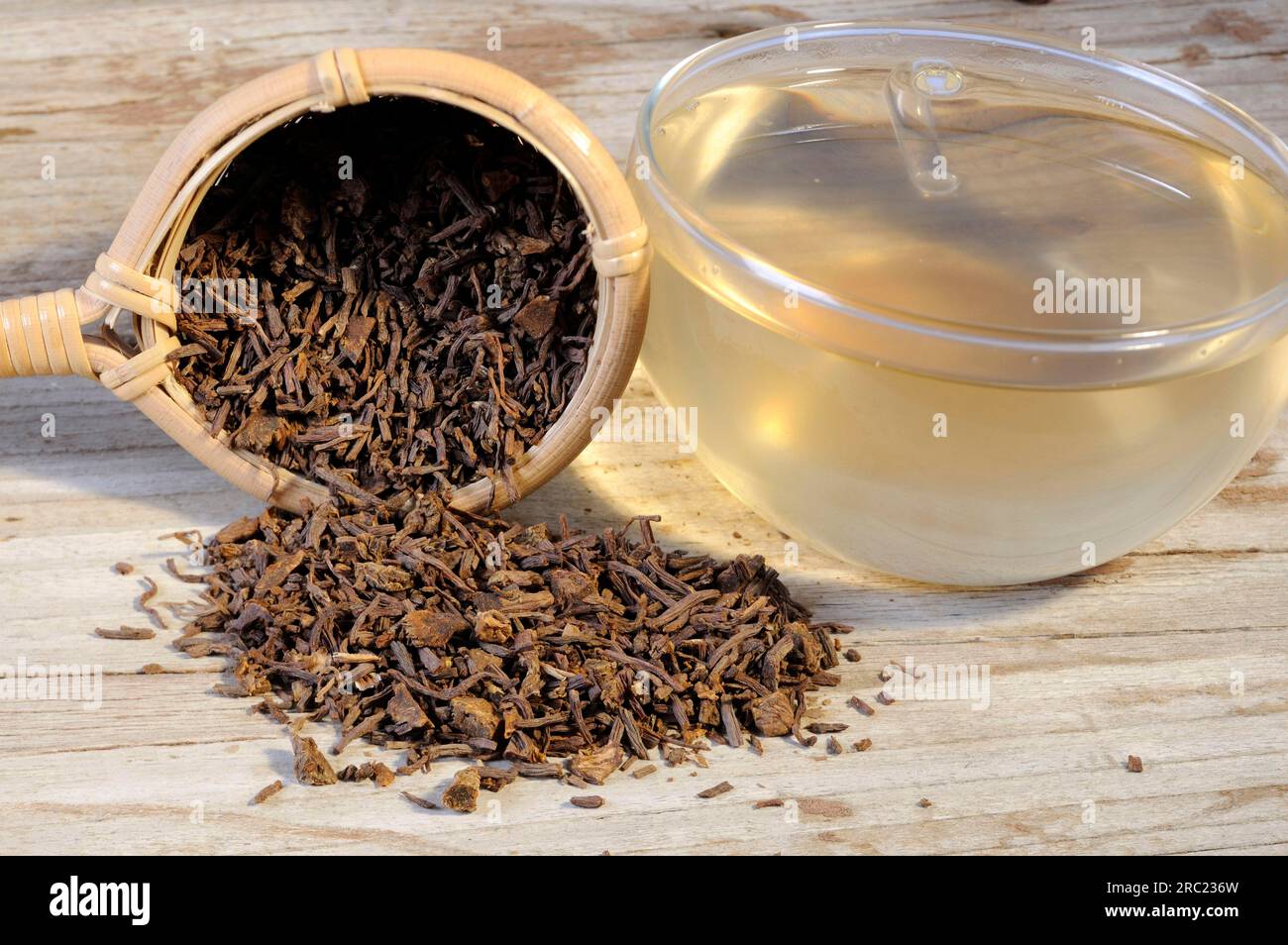 Cup of aster root tea (Asteris Radix), Zi Wan, aster root tea Stock Photo - Alamy