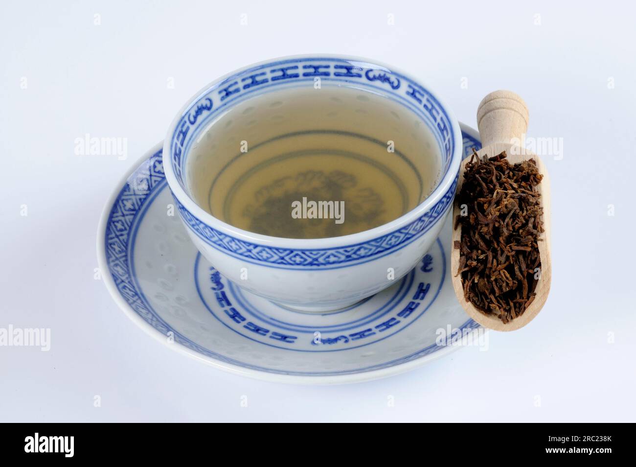 Cup of aster root tea (Asteris Radix), Zi Wan, aster root tea Stock Photo - Alamy