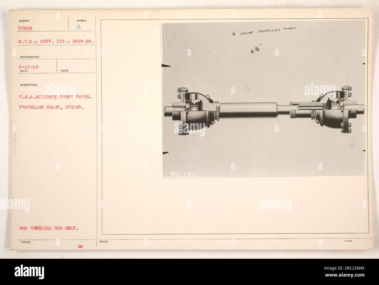 Close-up of U.S. military truck parts showing a propeller shaft with ...