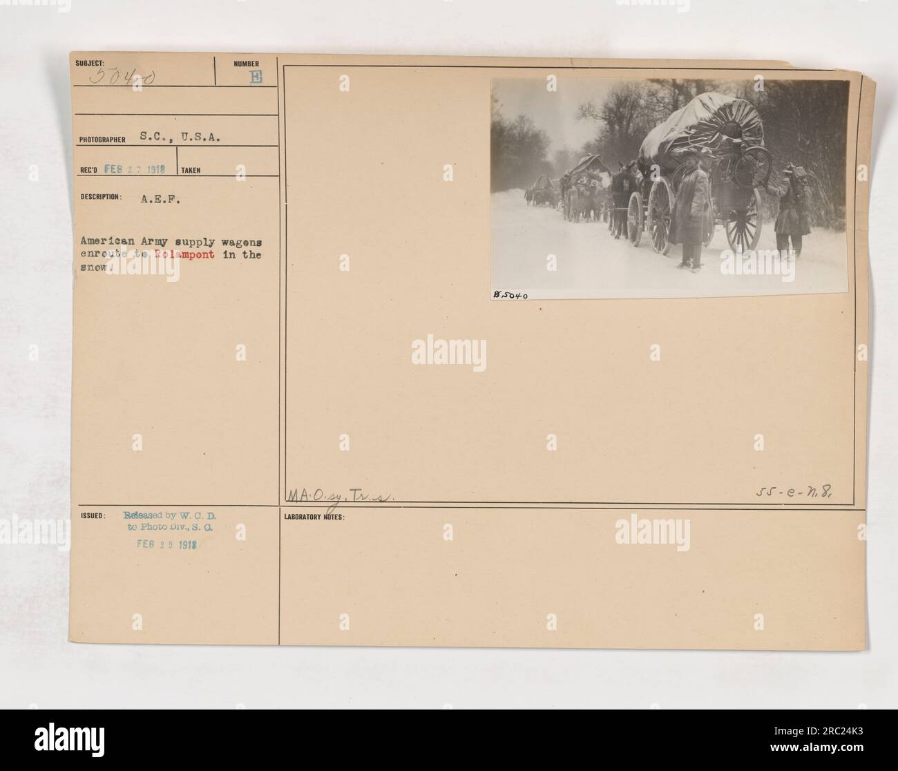 American Army supply wagons make their way through the snowy terrain on ...