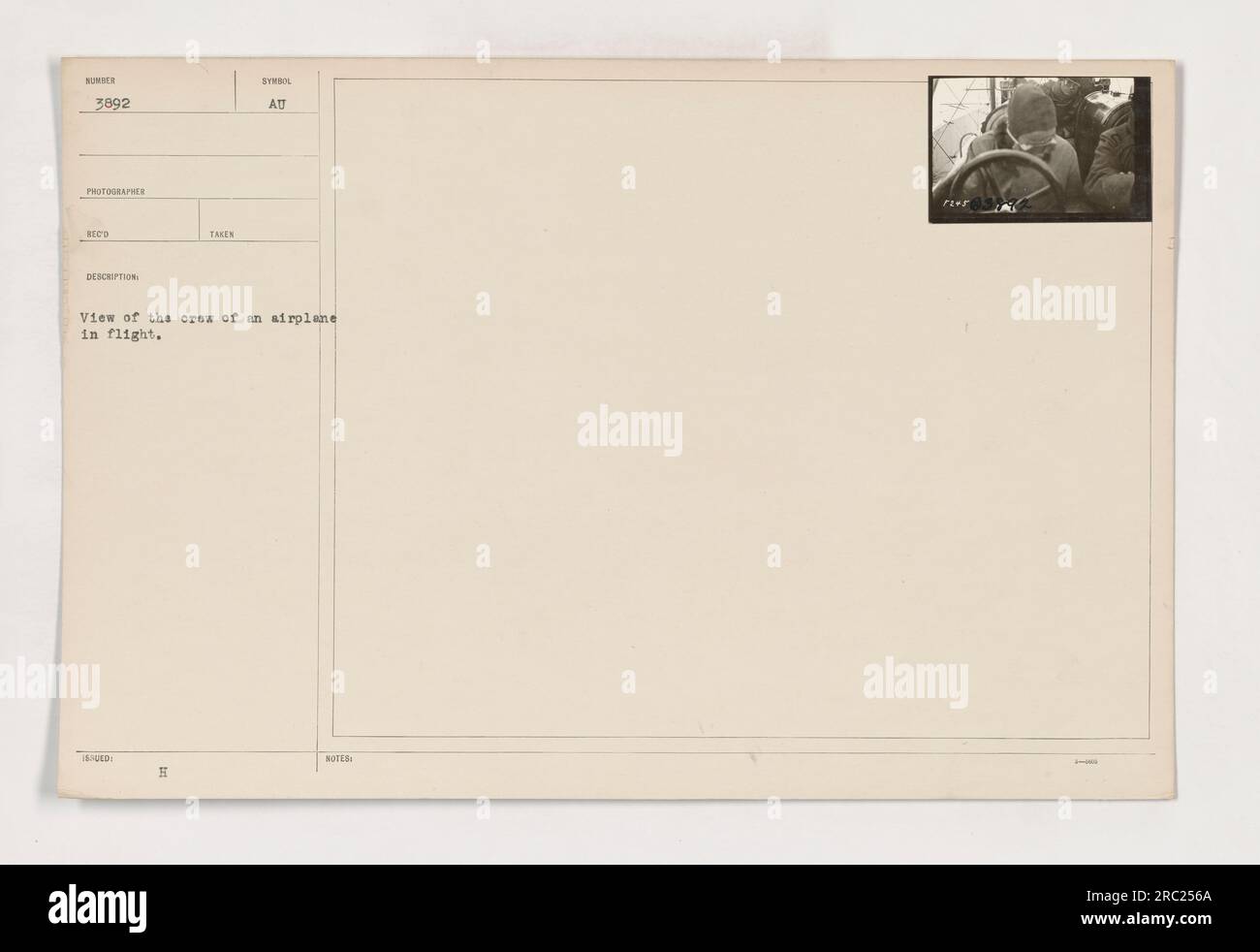 World War One: View of an airplane crew in flight. The crew members are ...