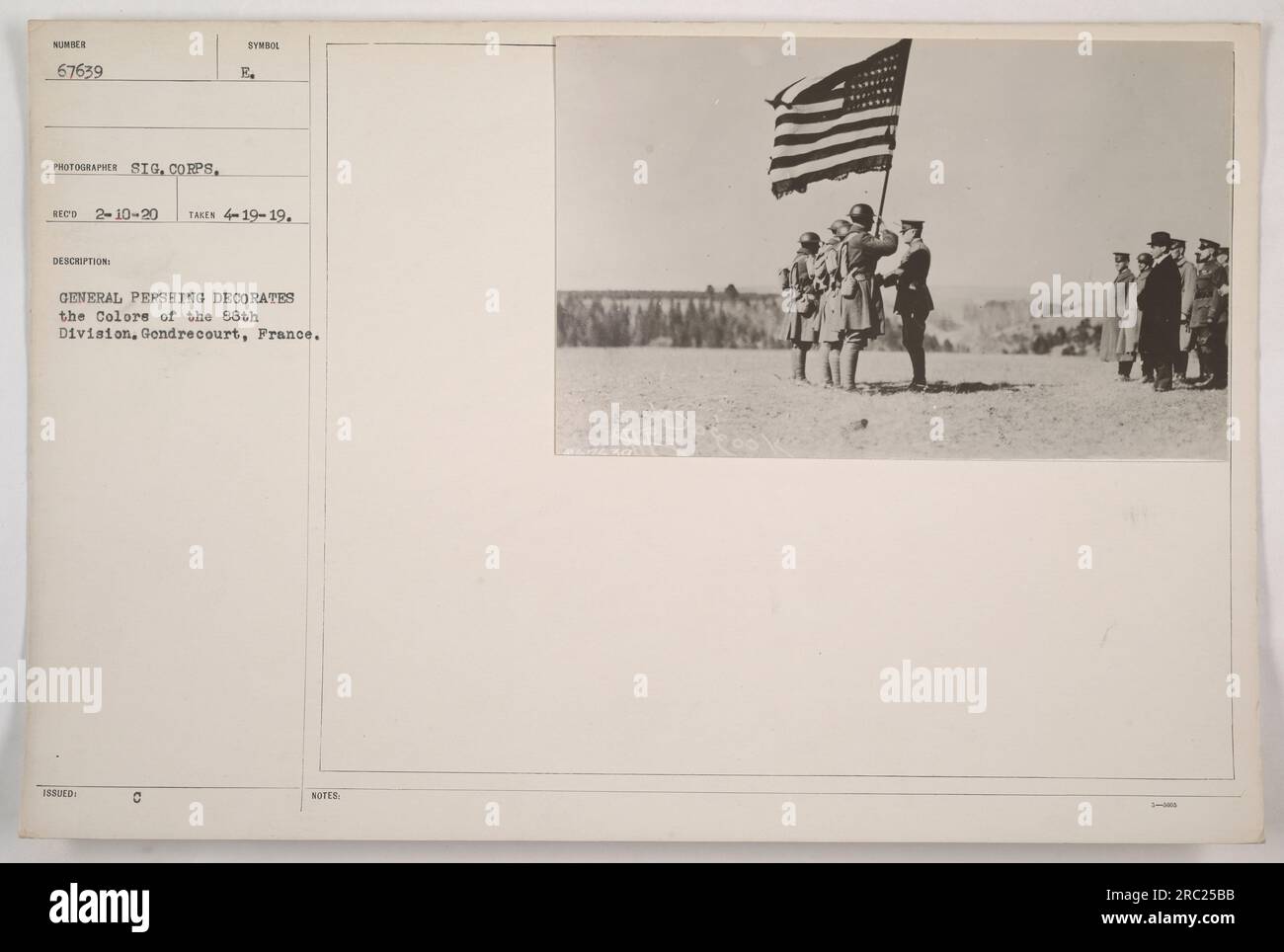 The photograph showcases General Pershing participating in a ceremony ...