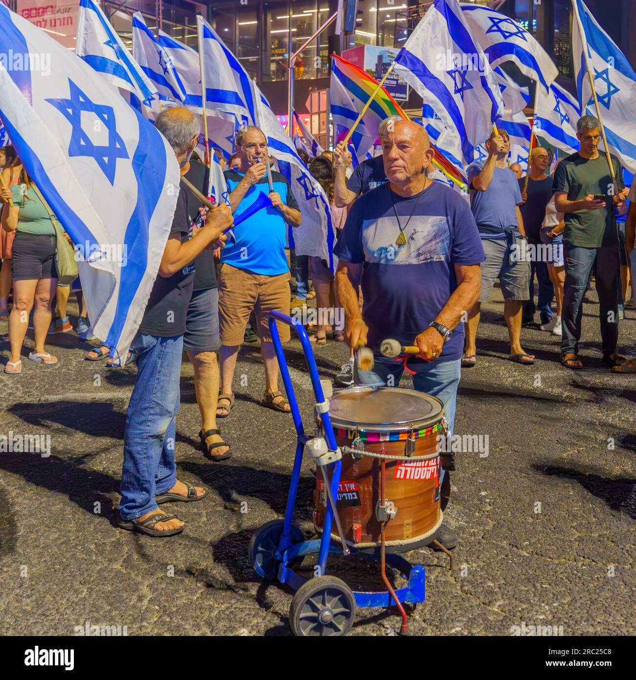 Haifa, Israel - July 11, 2023: People protest with flags and various ...