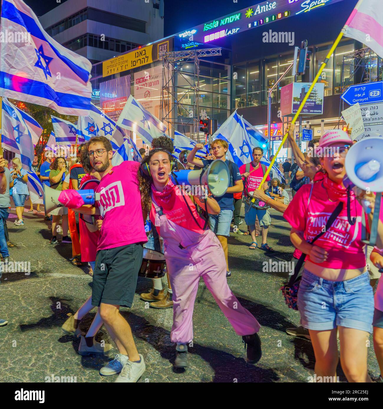Haifa, Israel - July 11, 2023: People protest with flags and various ...