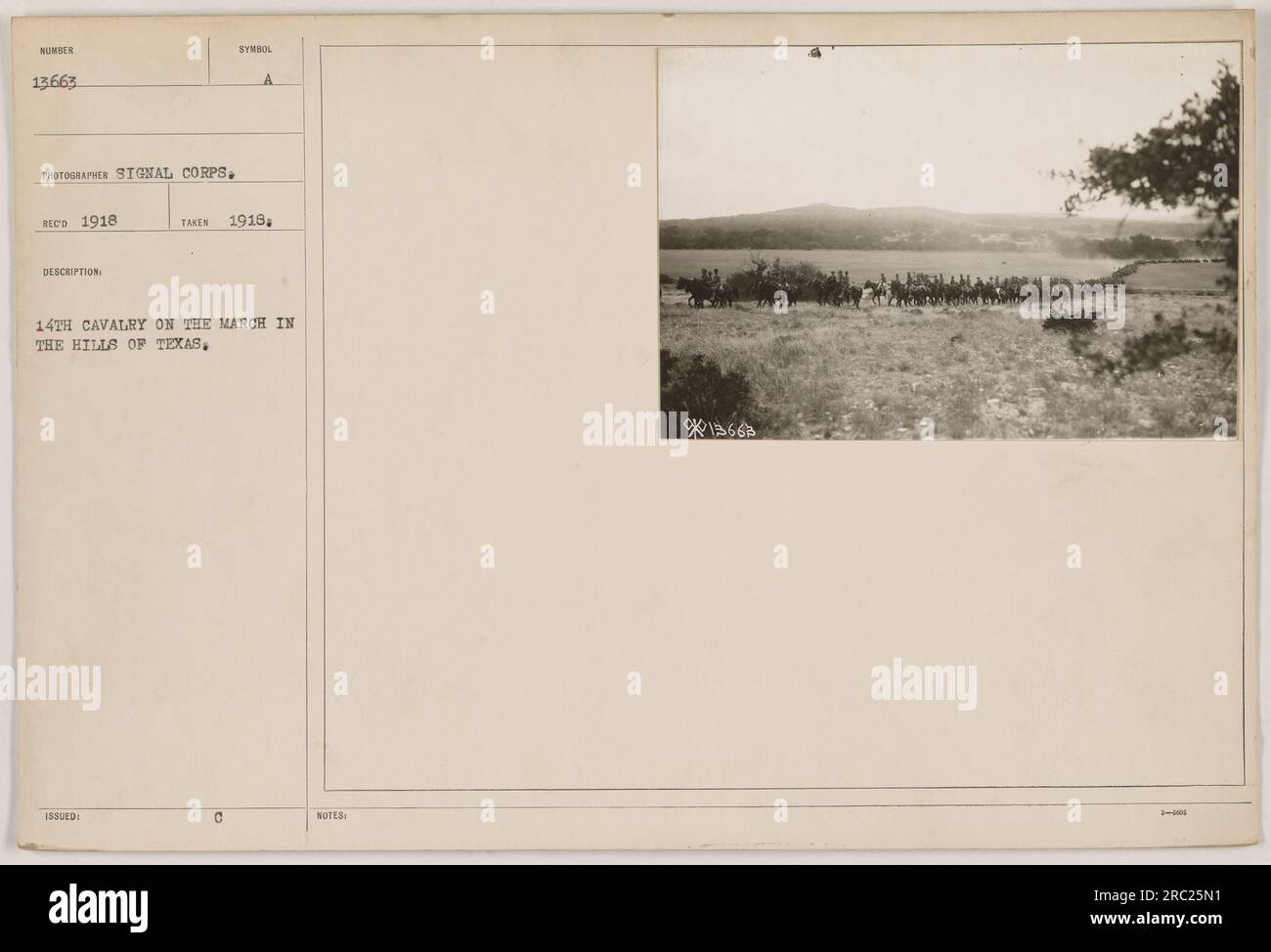 Soldiers from the 14th Cavalry are seen marching through the hilly ...