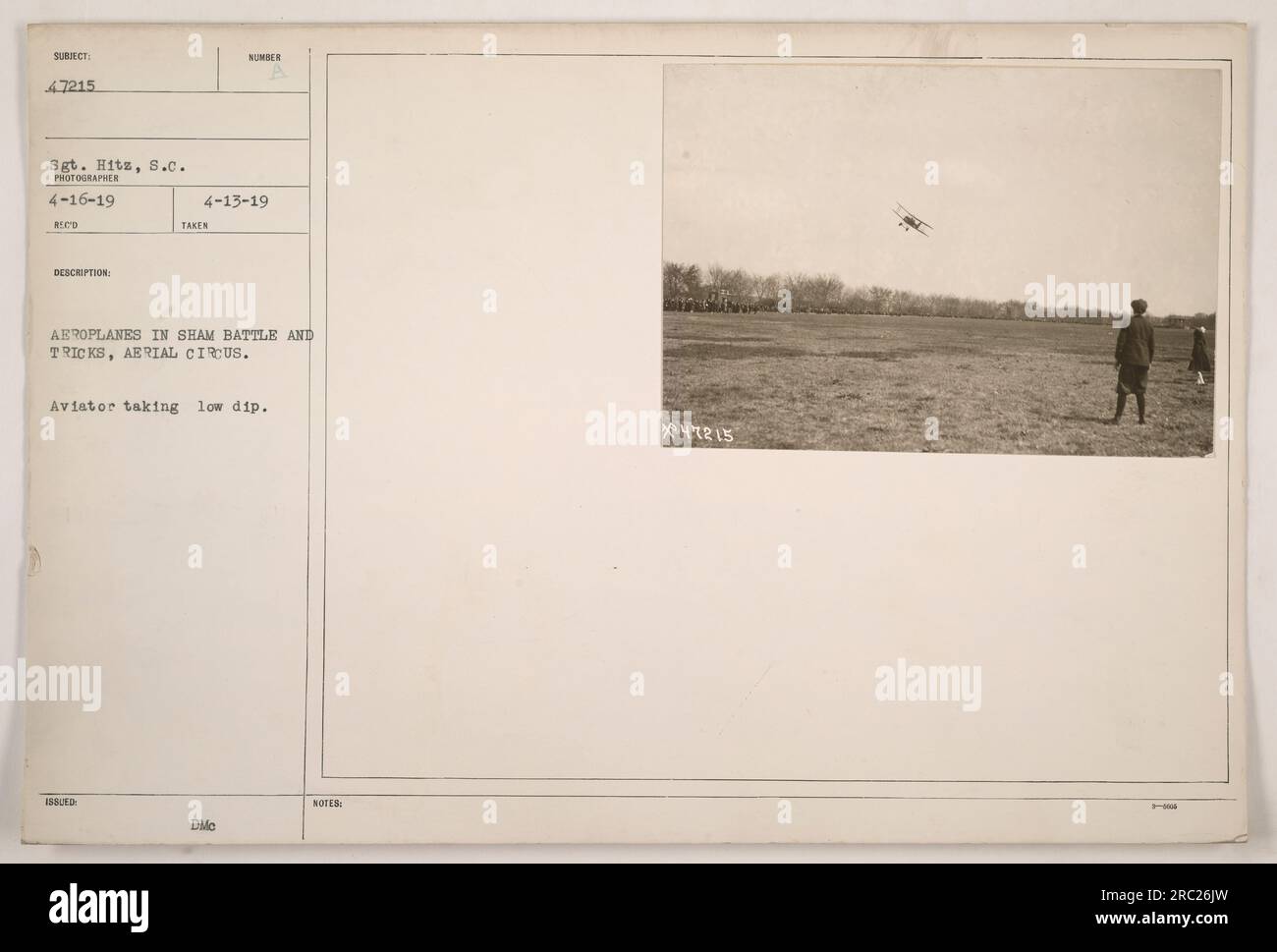 An aviator takes a low dip during a sham battle and tricks performance ...