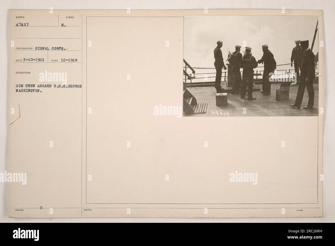 A gun crew is seen onboard the U.S.S. George Washington during World ...