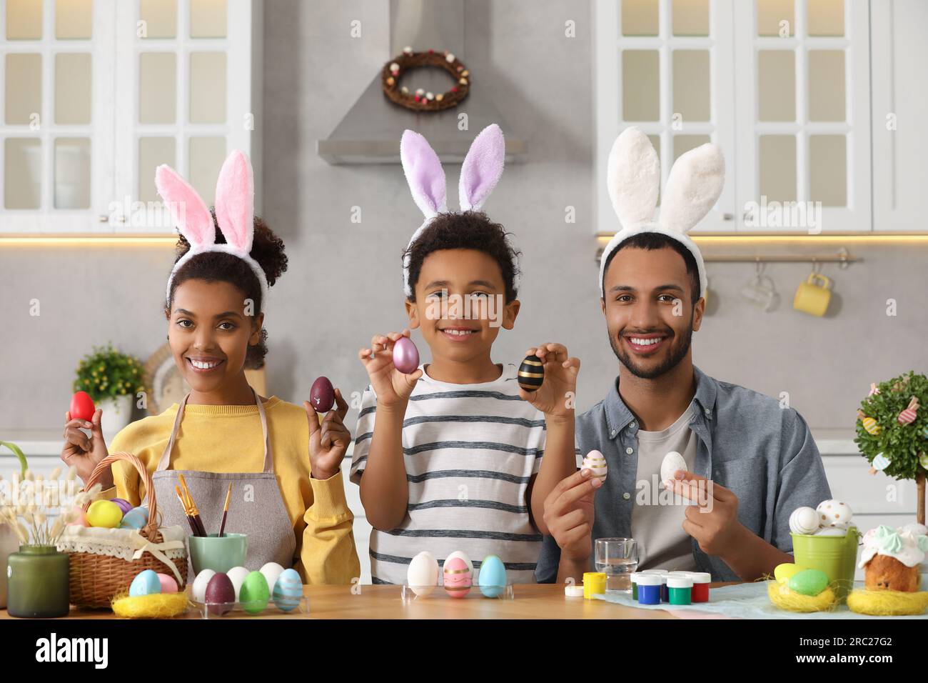 Happy african family easter eggs hi-res stock photography and images ...