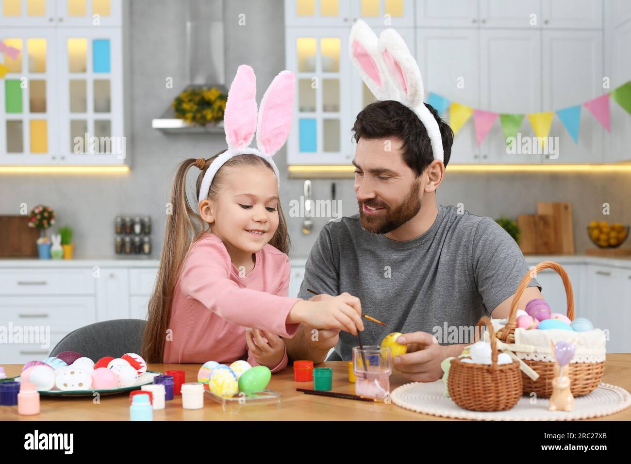 Father daughter color easter eggs hi-res stock photography and images ...