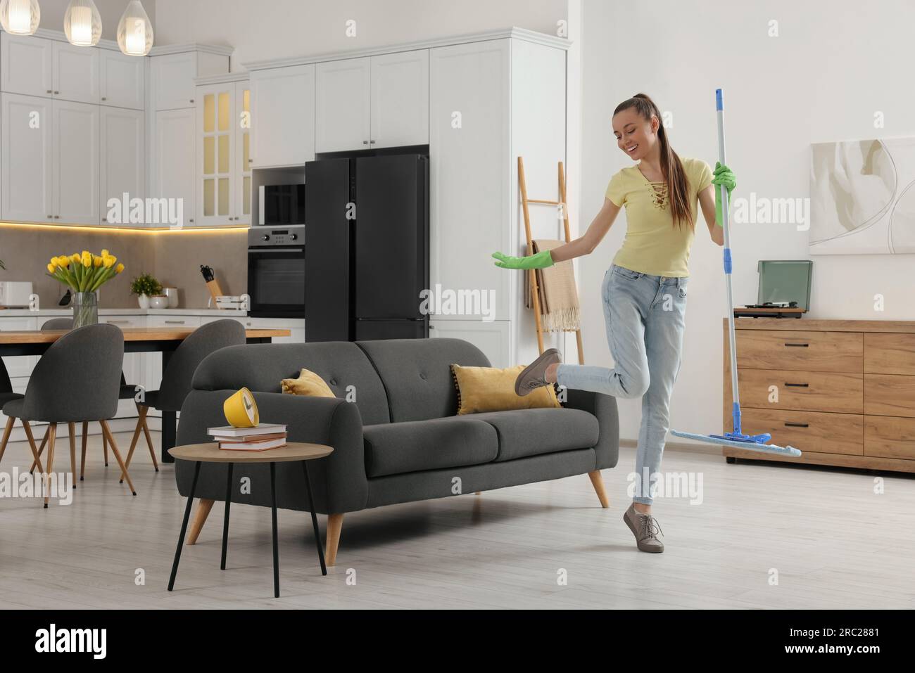 Dancing cleaning house hi-res stock photography and images - Alamy