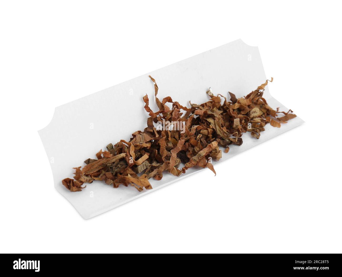 Making hand rolled cigarette. Paper with tobacco isolated on white ...