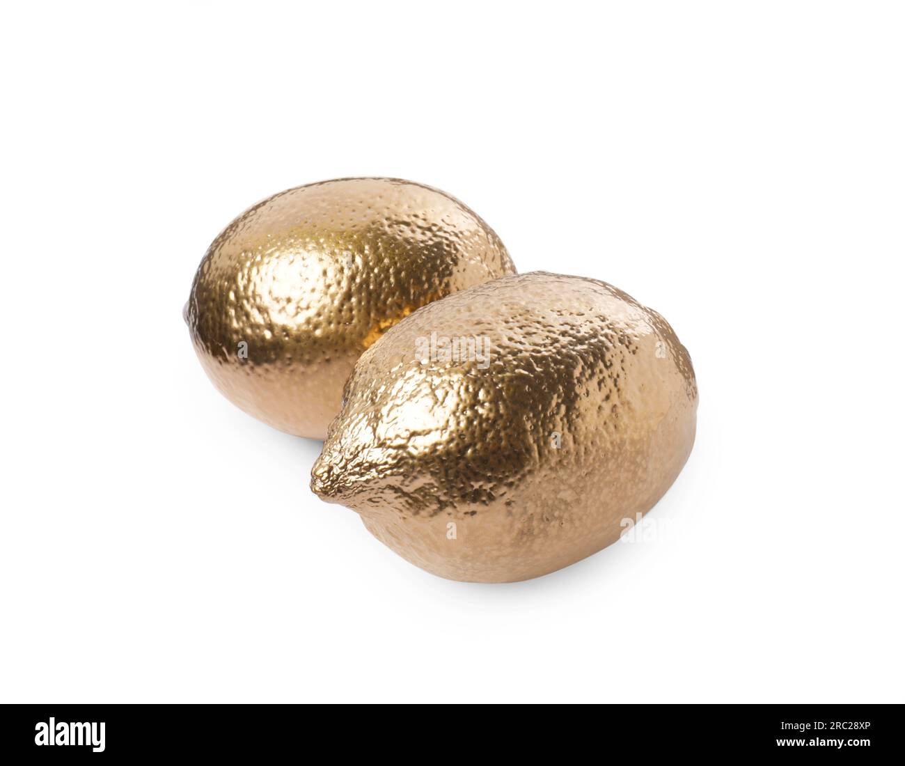 Shiny stylish golden lemons on white background Stock Photo - Alamy