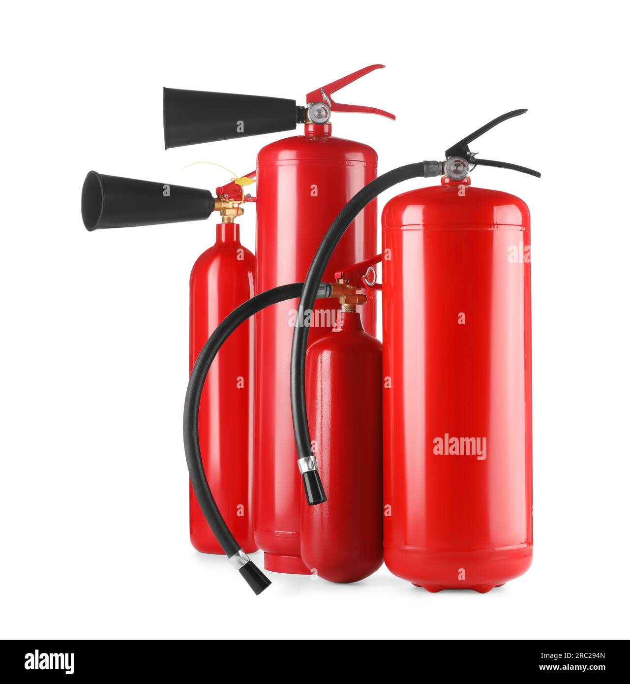Many red fire extinguishers on white background Stock Photo - Alamy