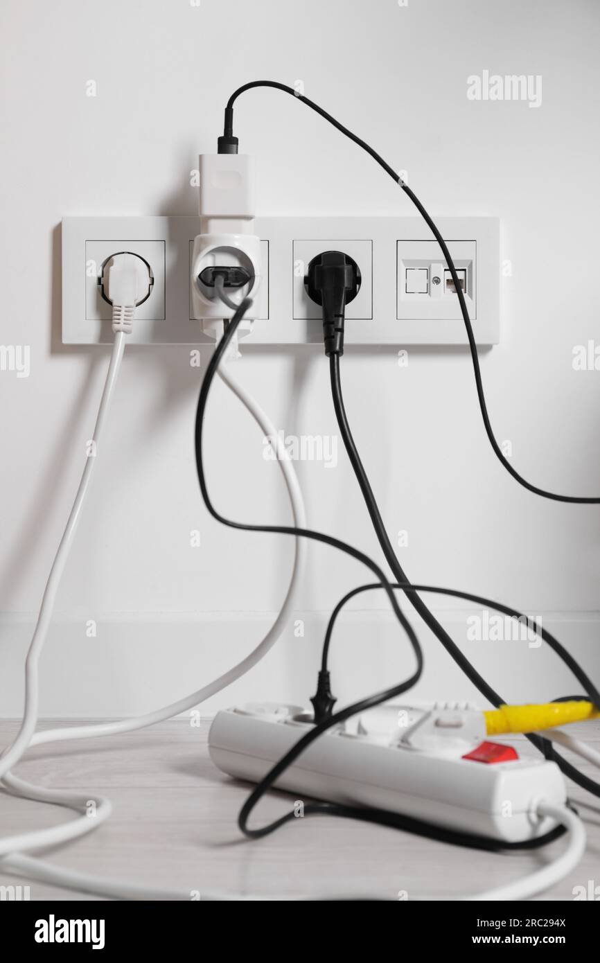 Multiple electrical plugs in wall hi-res stock photography and images ...