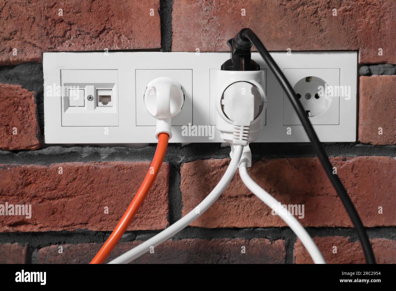 Multiple electrical plugs in wall hi-res stock photography and images ...