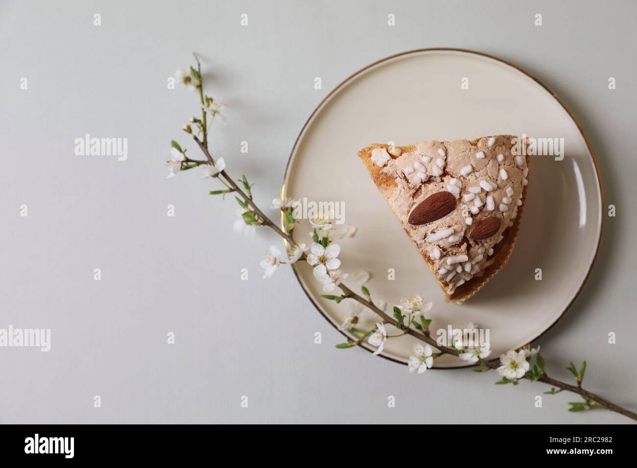Plate with piece of delicious Italian Easter dove cake (traditional ...