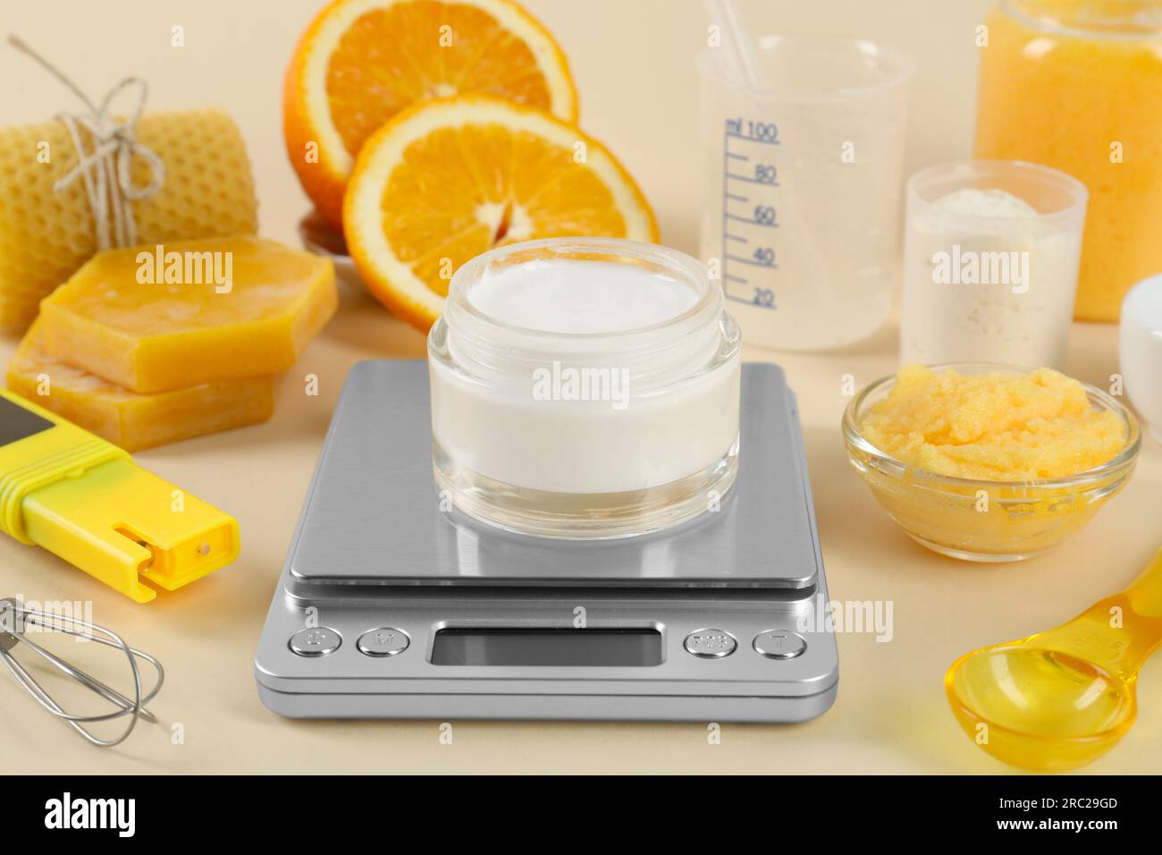 Homemade cosmetic products and fresh ingredients on beige background ...