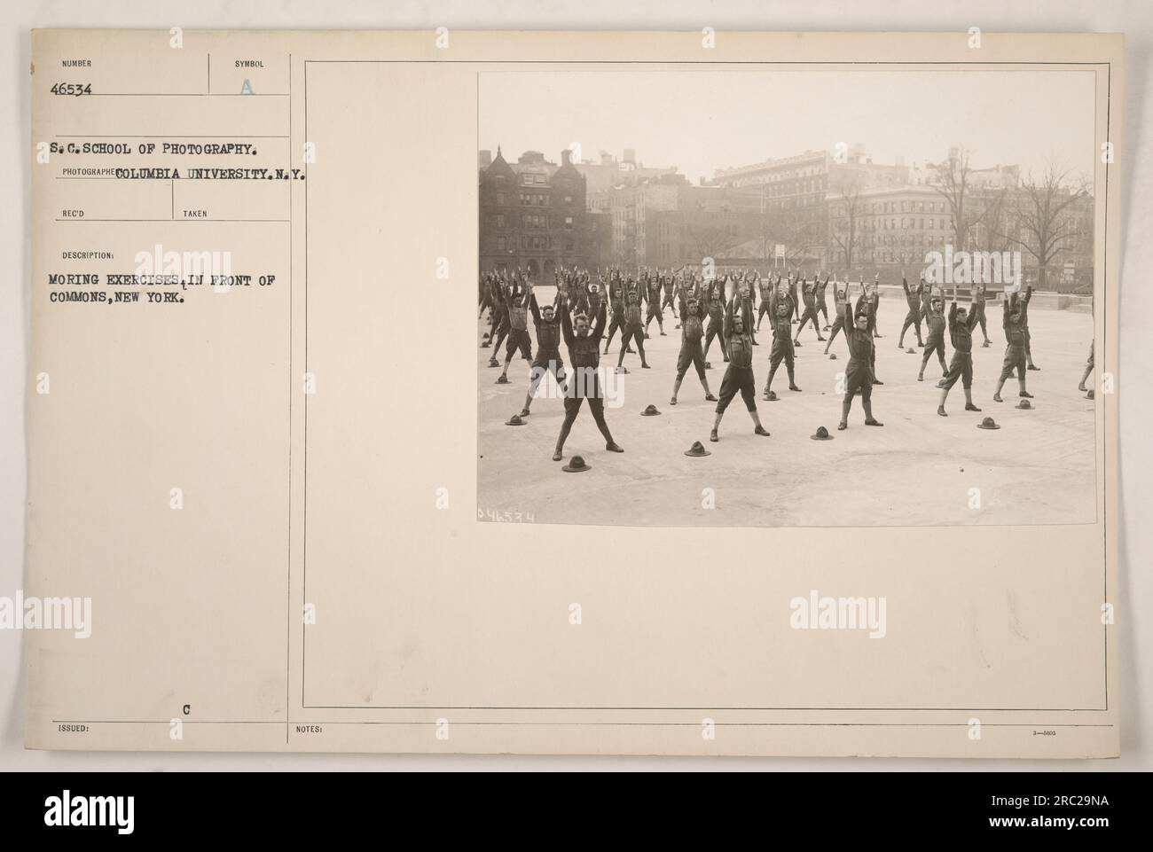 Soldiers participating in morning exercises in front of the commons in ...