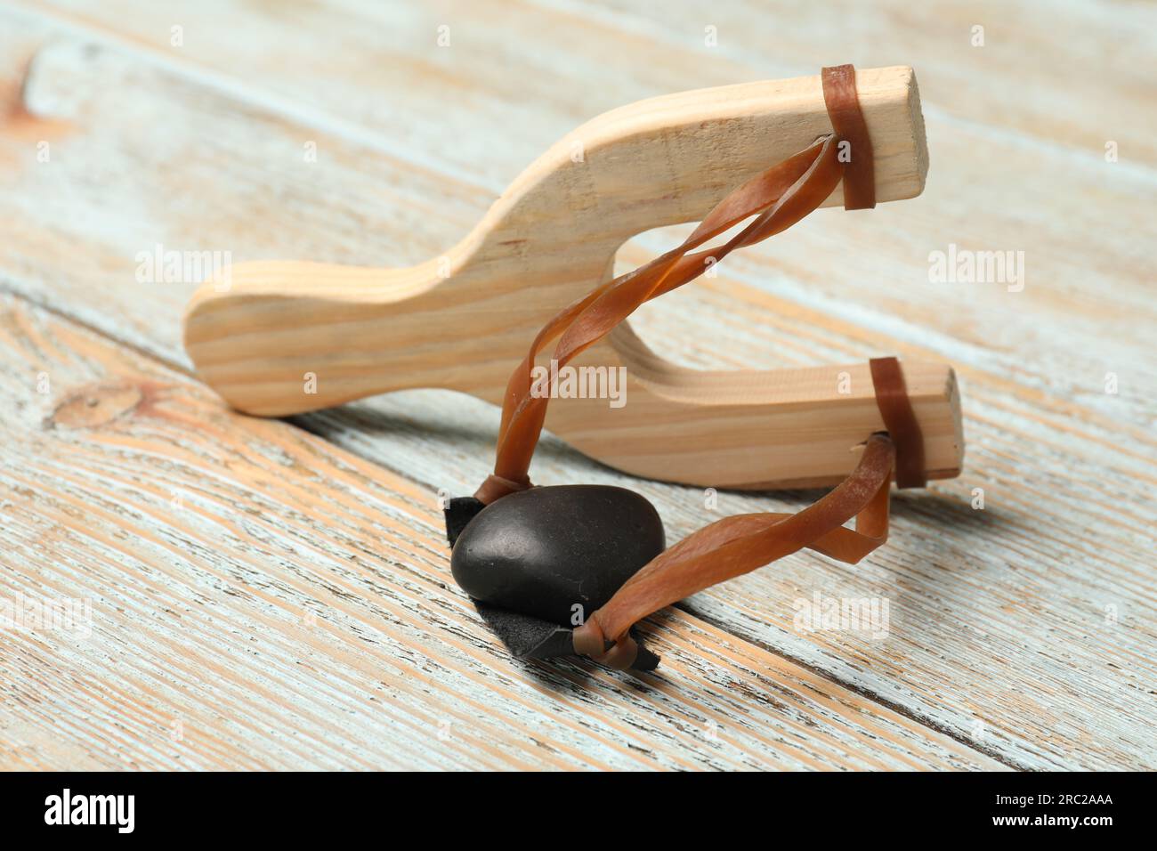 Old wooden slingshot stone on hi-res stock photography and images - Alamy