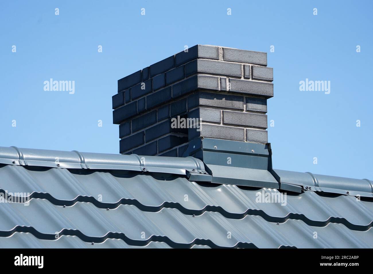 Chimney. Roof of a building with chimney Stock Photo - Alamy