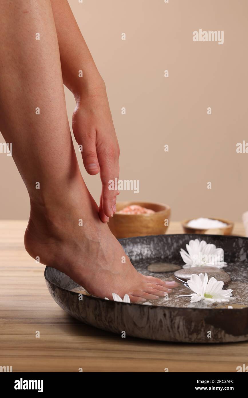 Dipping foot in water hi-res stock photography and images - Alamy