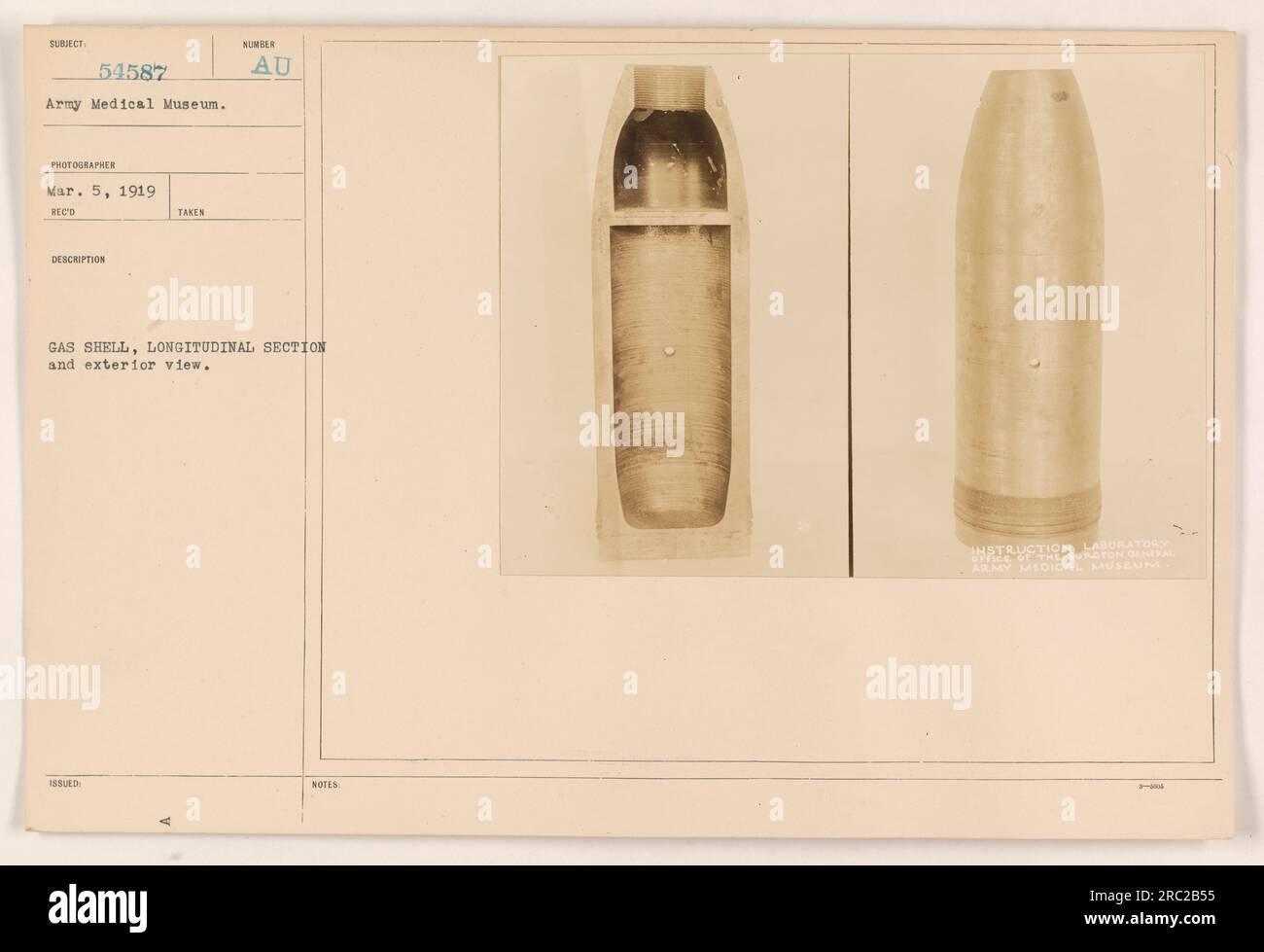 This photograph shows a gas shell which is cut in half to reveal its ...