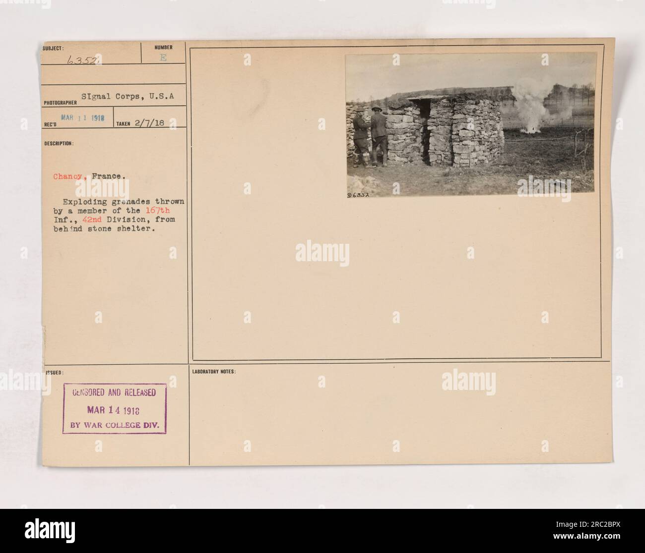 Caption: Members of 167th Infantry, 42nd Division, throw grenades from ...