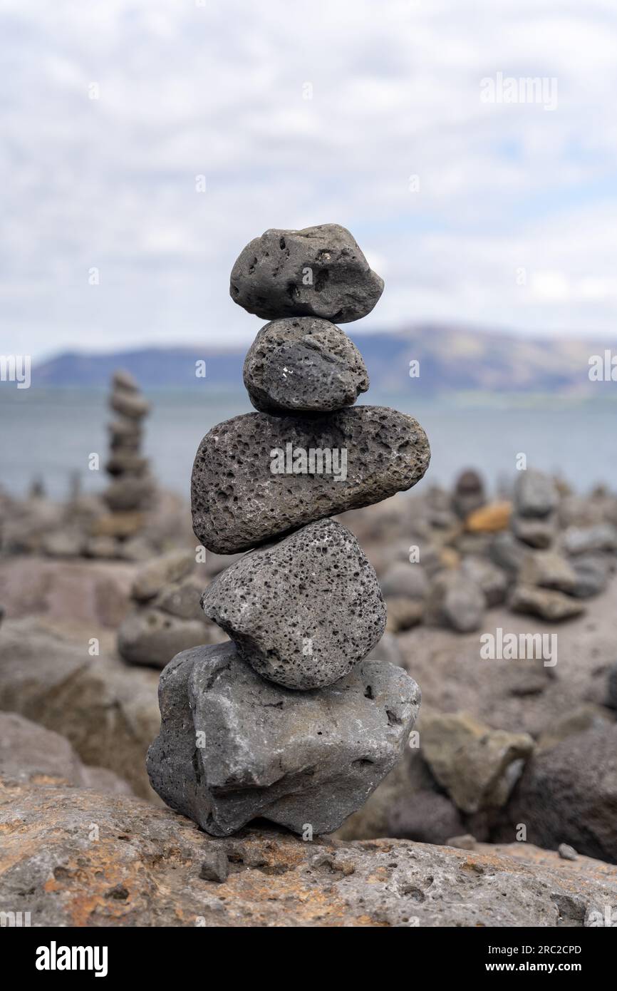 Stack of stones at embankment in Reykjavik, Iceland Stock Photo - Alamy
