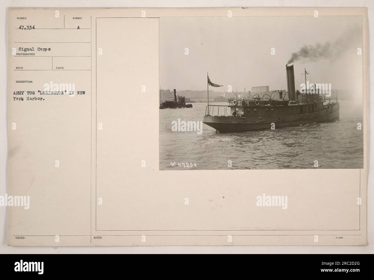 Image shows Army tug "Lexington" docked in New York Harbor. The ...