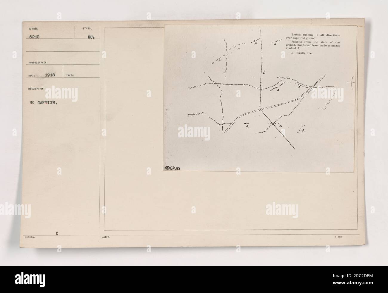 Tracks marking previously captured ground, with makeshift stands at ...