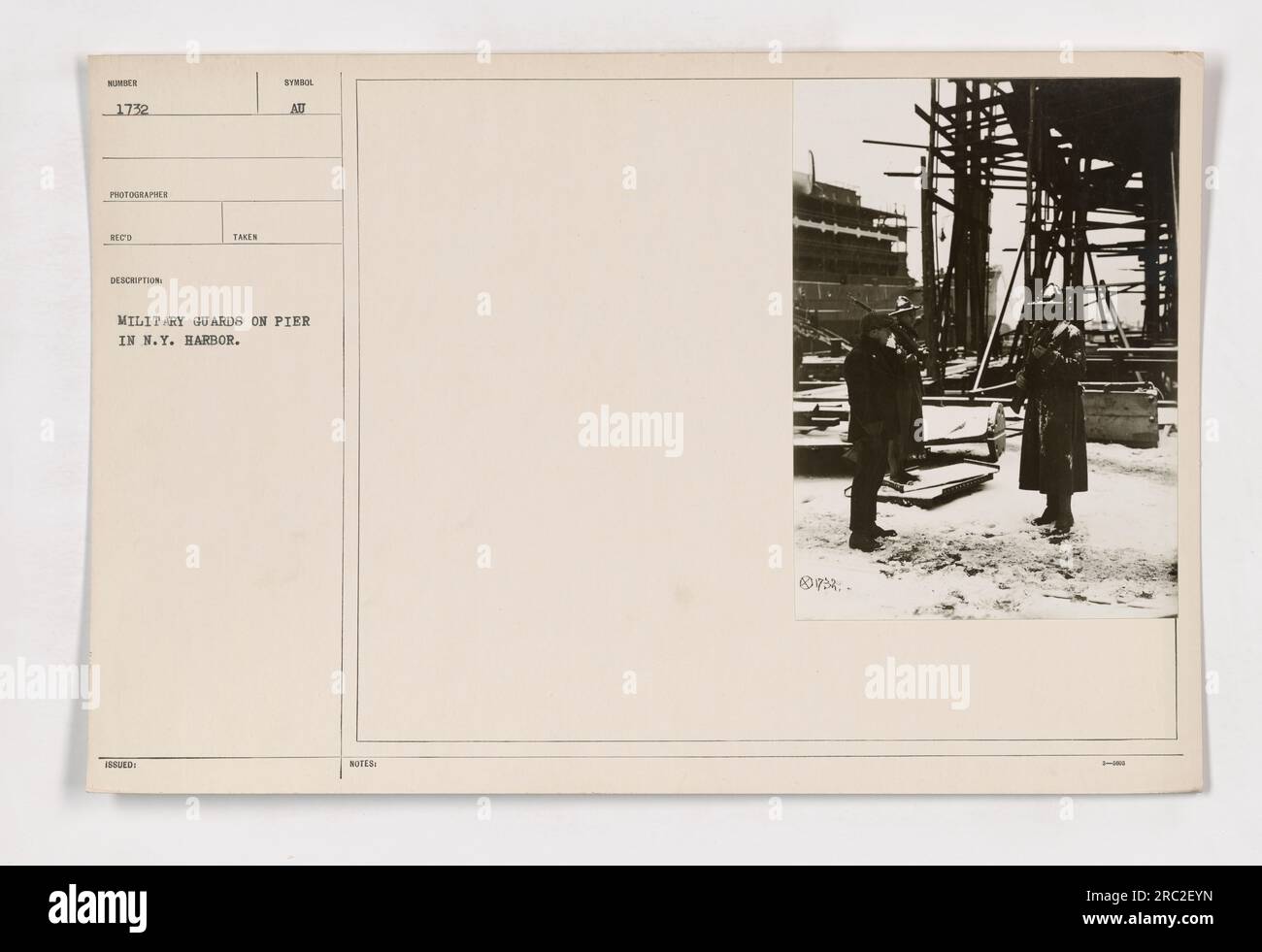 Military guards stand vigilant on a pier in the bustling New York ...