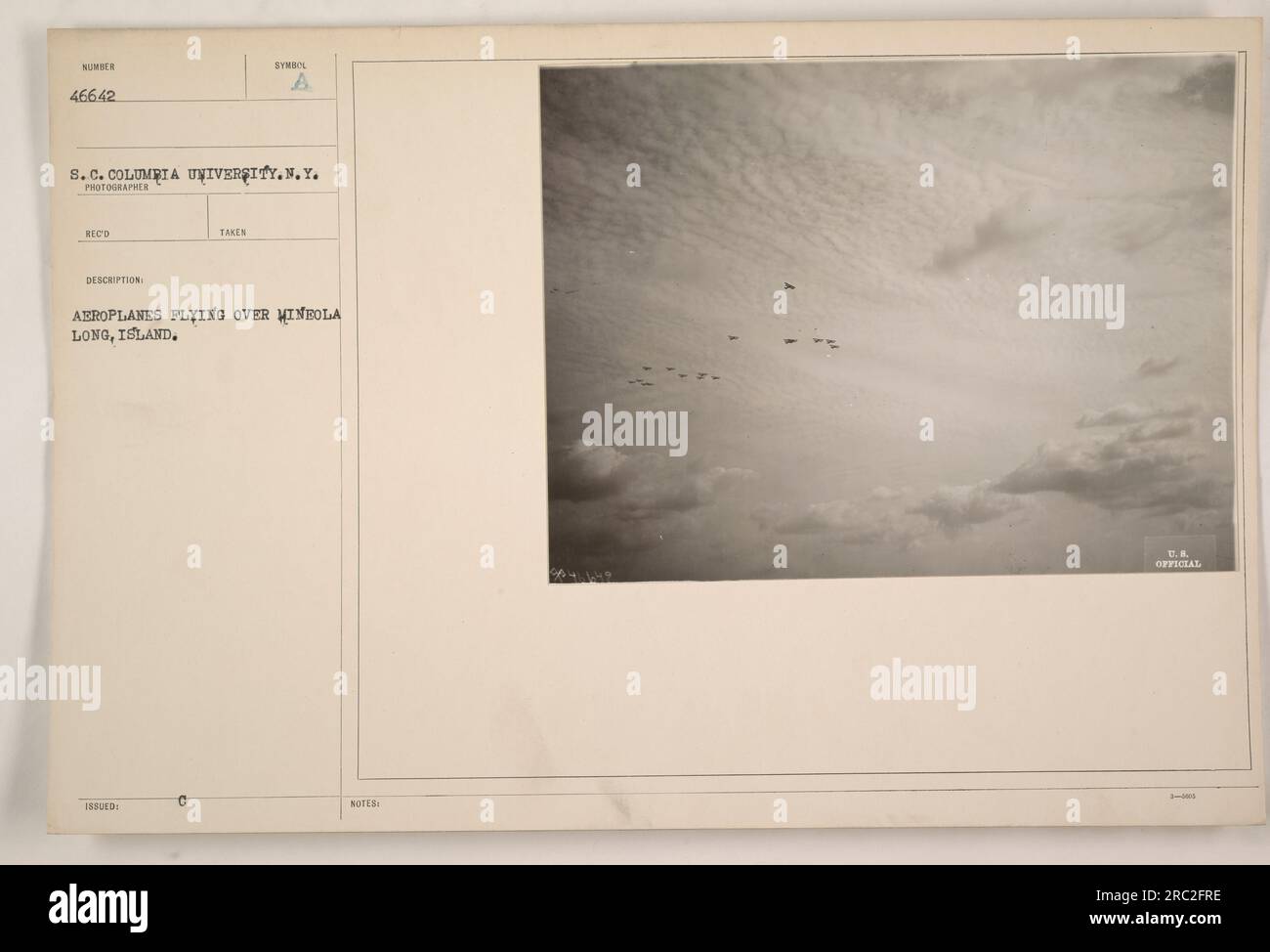 Aerial view of aeroplanes flying over Mineola, Long Island during World ...